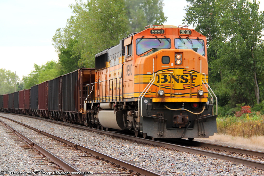 BNSF 9890 runs dpu on a loaded ore train.